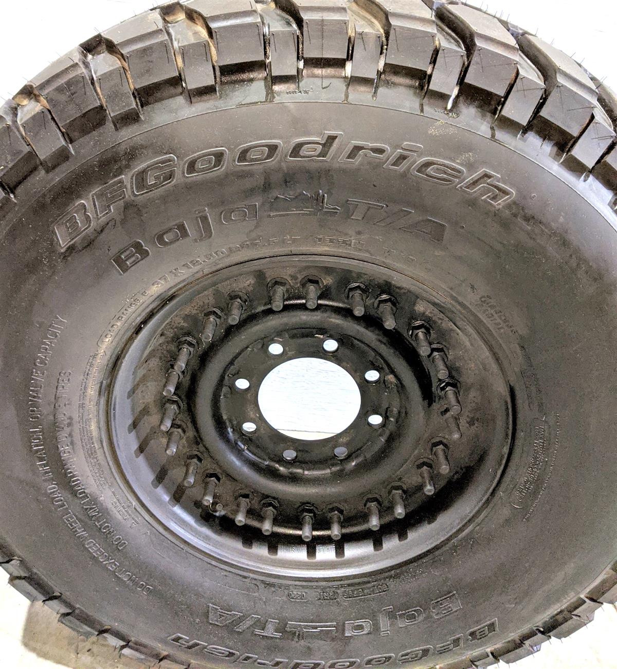 BF Goodrich Baja T/A 37X12.50R16.5LT Radial Tire Mounted on 24 Bolt Rim 100% Tread HMMWV